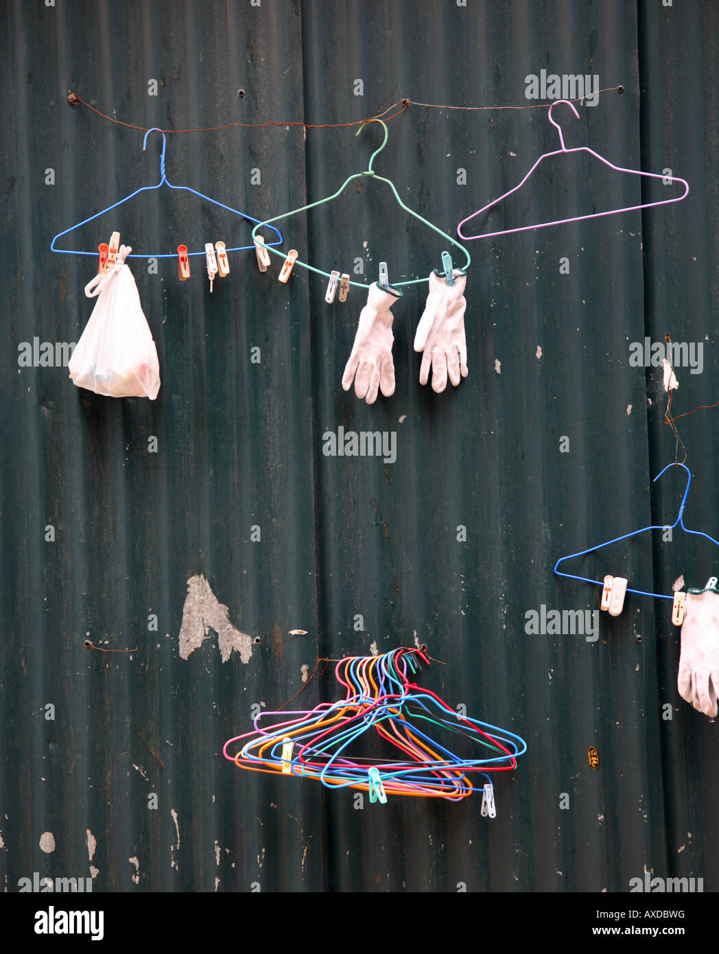 Clothes hangars on the side of a shed Yung Shue Wan Lamma Island Hong ...