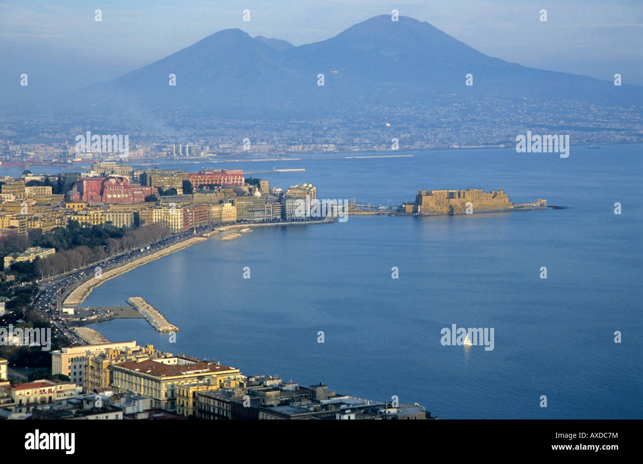 Bay of Naples and Mount Vesuvius in background, Naples, Italy - at dusk ...