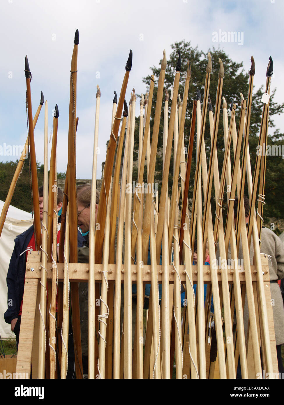 cross rack frame of wooden spears upwards many Stock Photo - Alamy