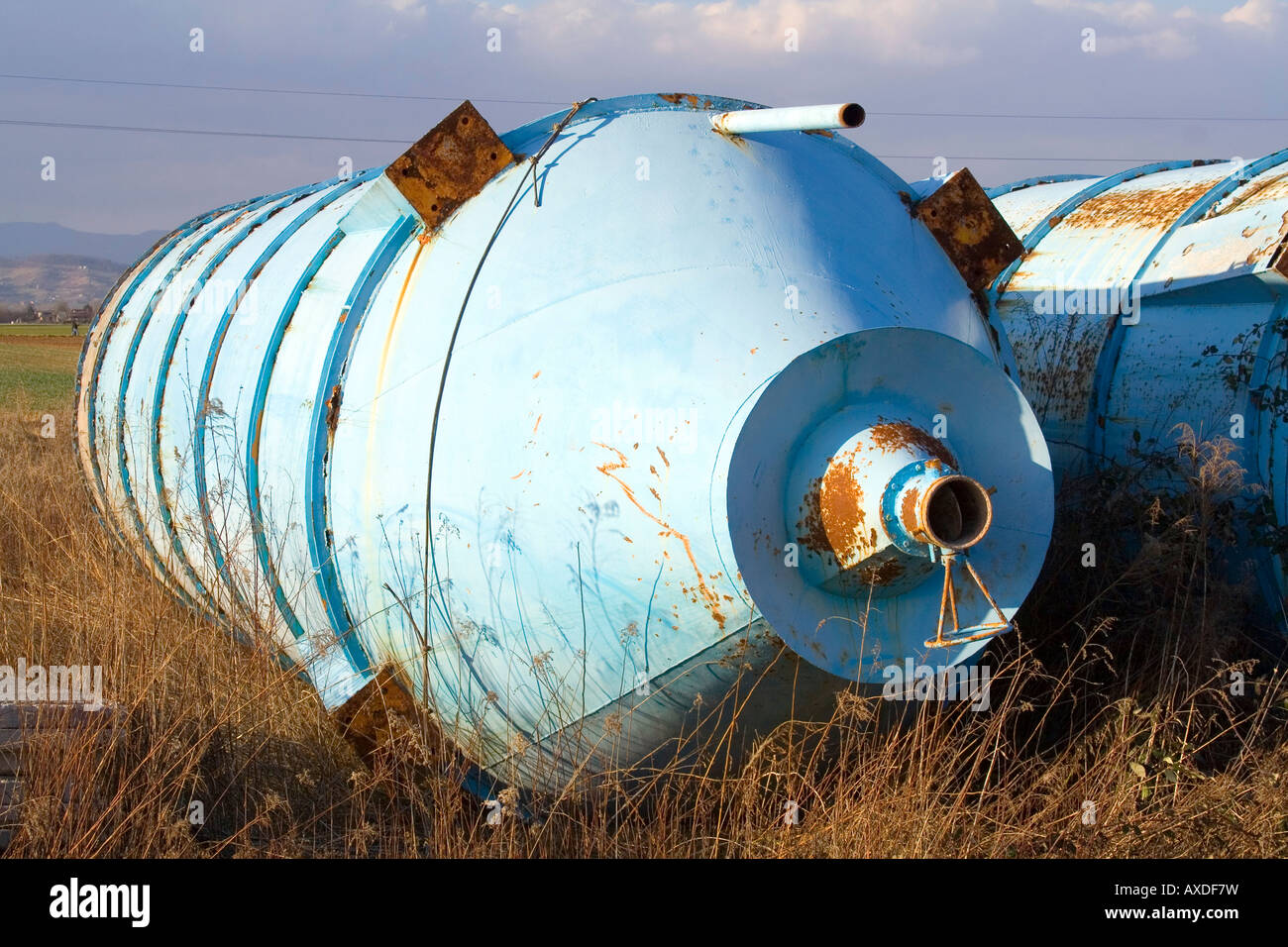 Old abandoned industry silos Stock Photo - Alamy
