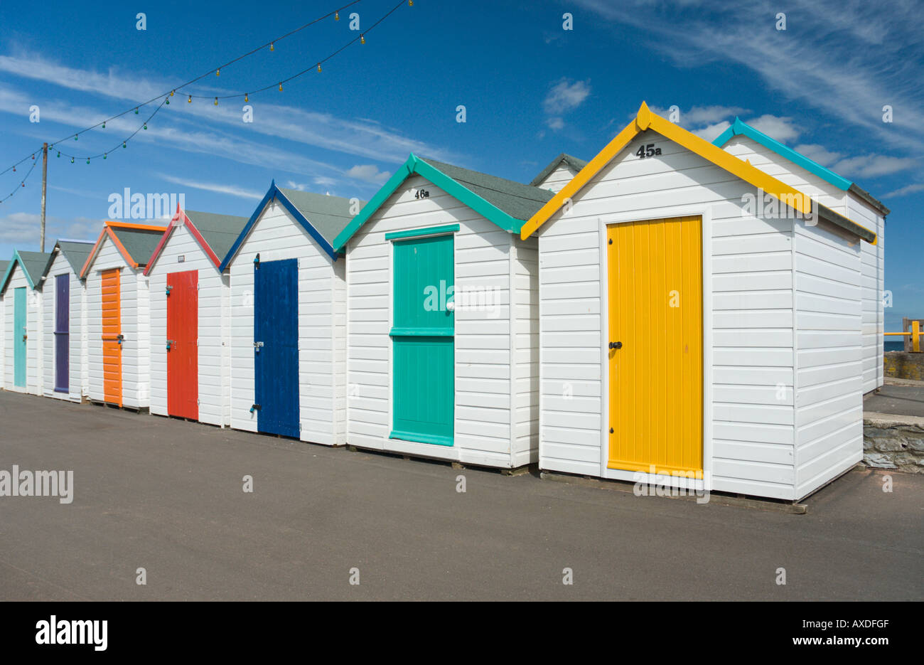 Colourfully painted beach huts hi-res stock photography and images - Alamy