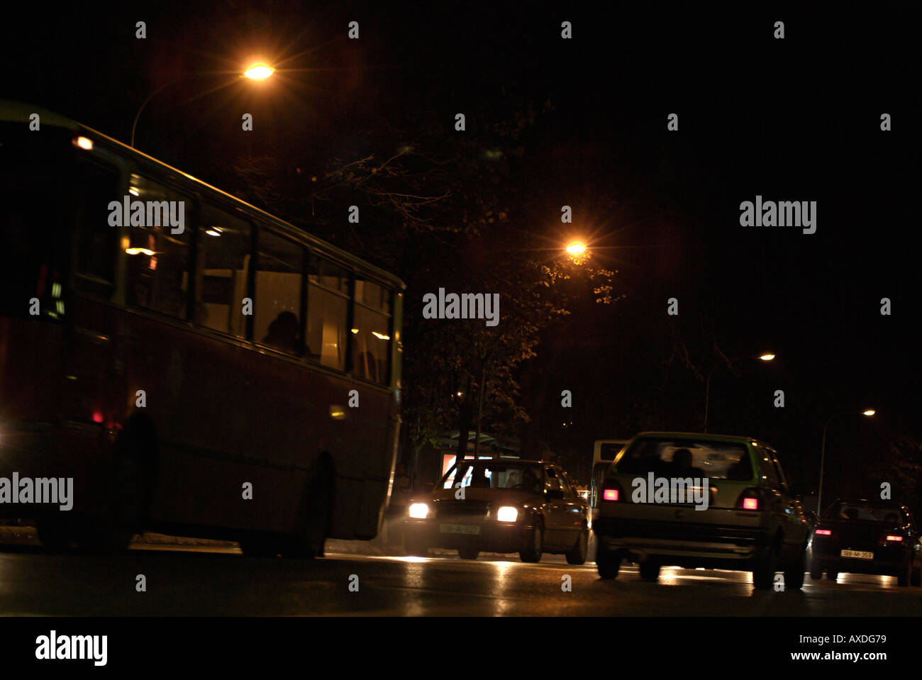 Traffic on a Busy City Street at Night Stock Photo - Alamy