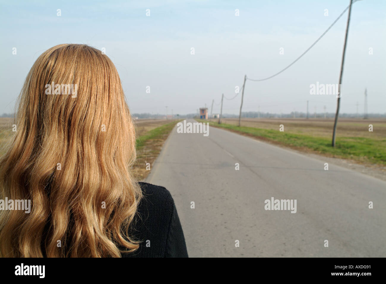 Looking down long rural road hi-res stock photography and images - Alamy