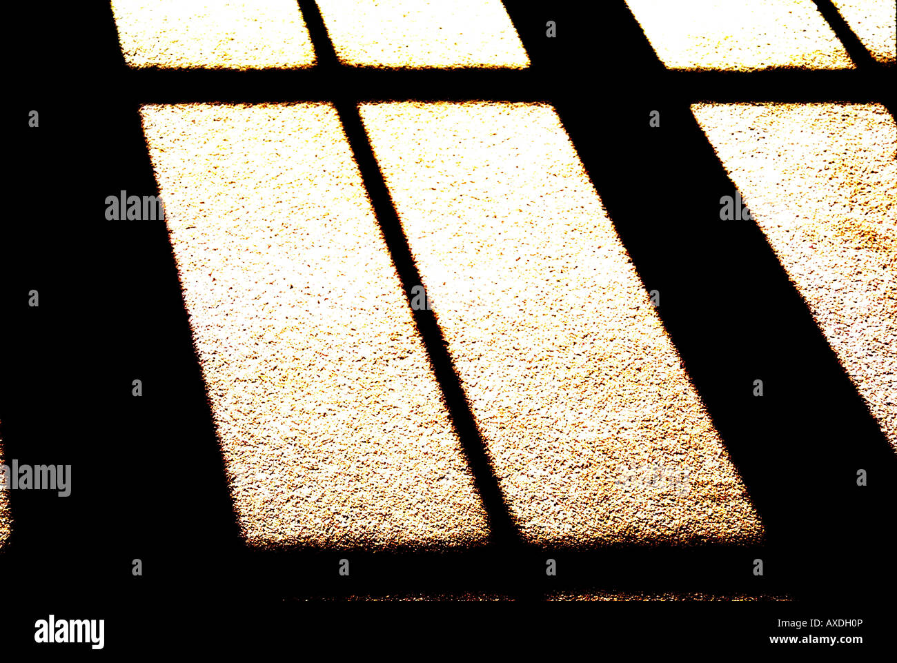Shadow of window frames on carpet Stock Photo - Alamy