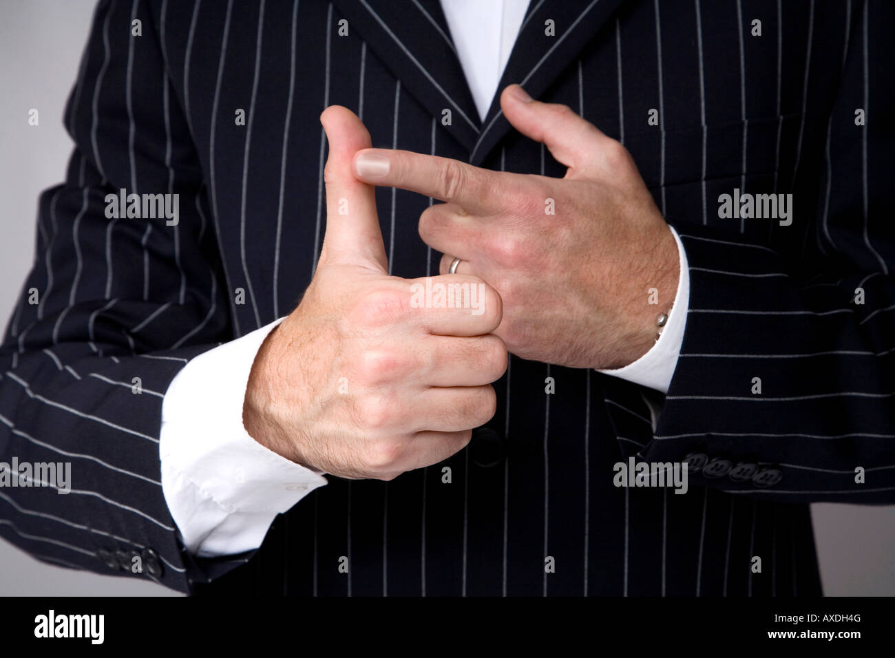 Man making hand gesture, counting, close-up Stock Photo - Alamy