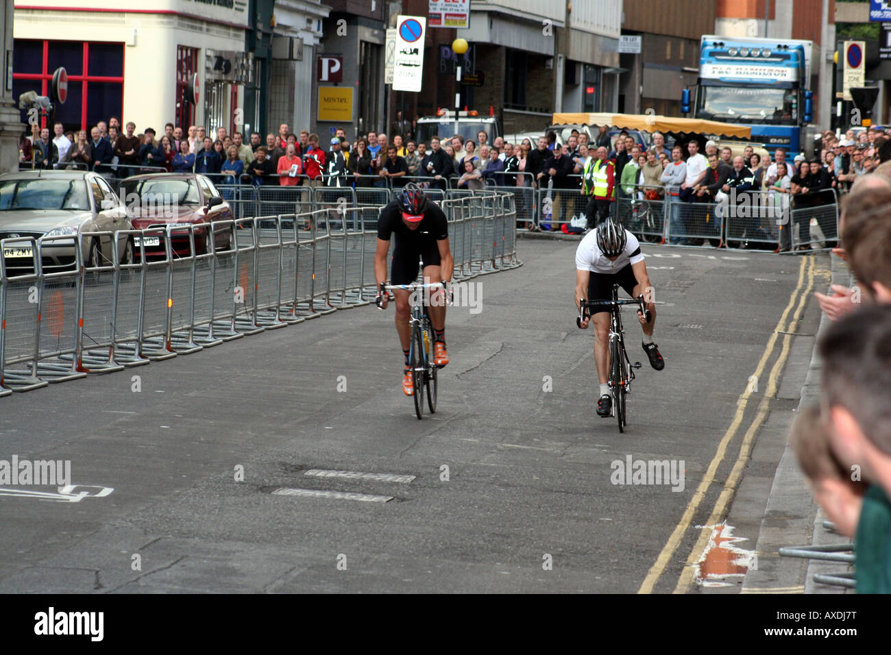 Racing cyclist pulls his foot out of the pedal in the final sprint ...