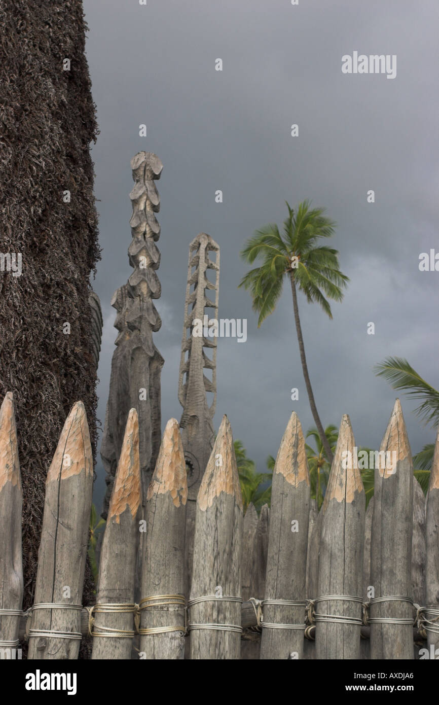 Protection. A palisade of sharpened sticks protects the burial place ...