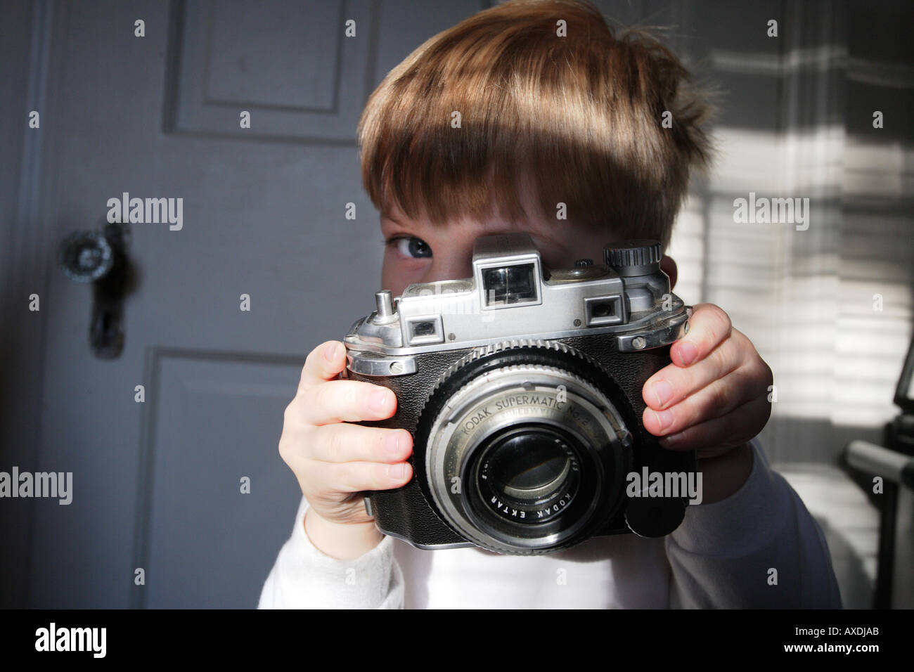 Child with Old Camera Antique camera looking through viewfinder ...