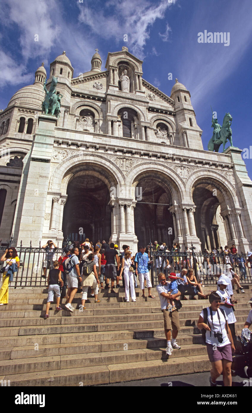 Tourists on the steps of the Sacre Coeur church in Paris Stock Photo ...