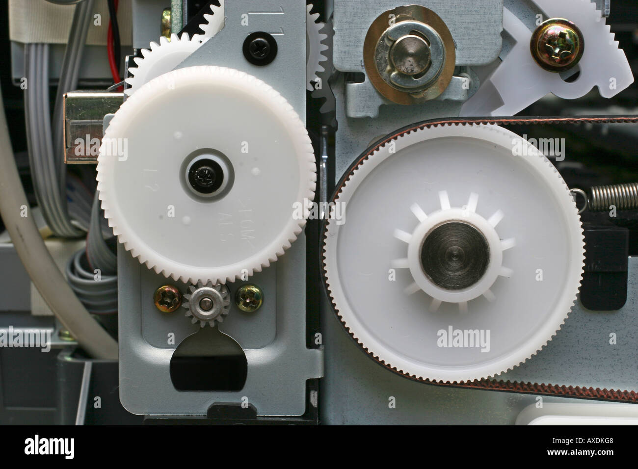 Nylon gear train and drive system inside inkjet printer Stock Photo - Alamy