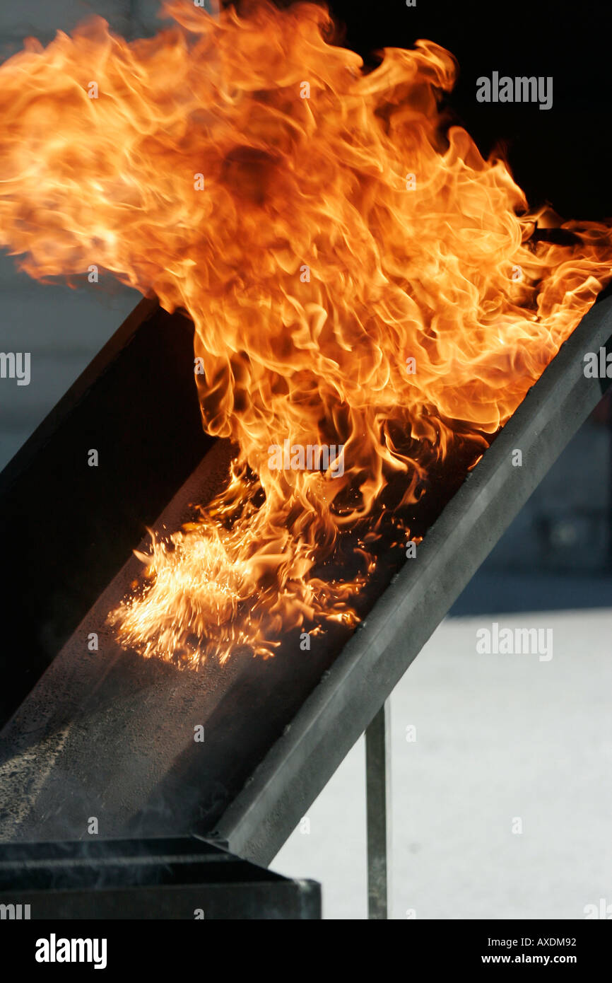 Fire in a metal ramp Stock Photo - Alamy