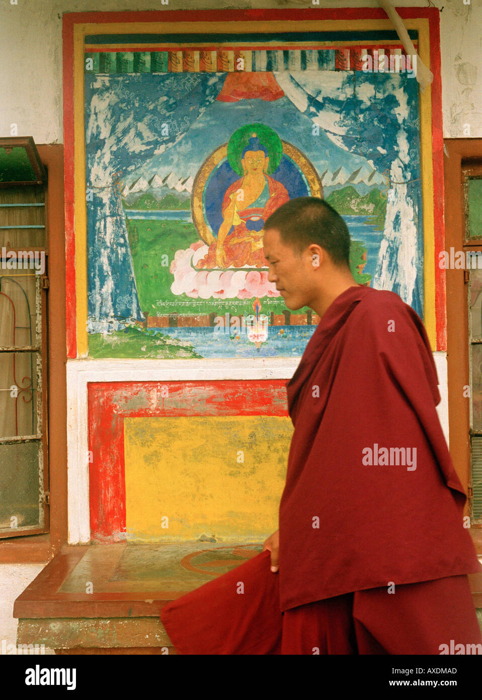 Buddha painting and monk Stock Photo - Alamy