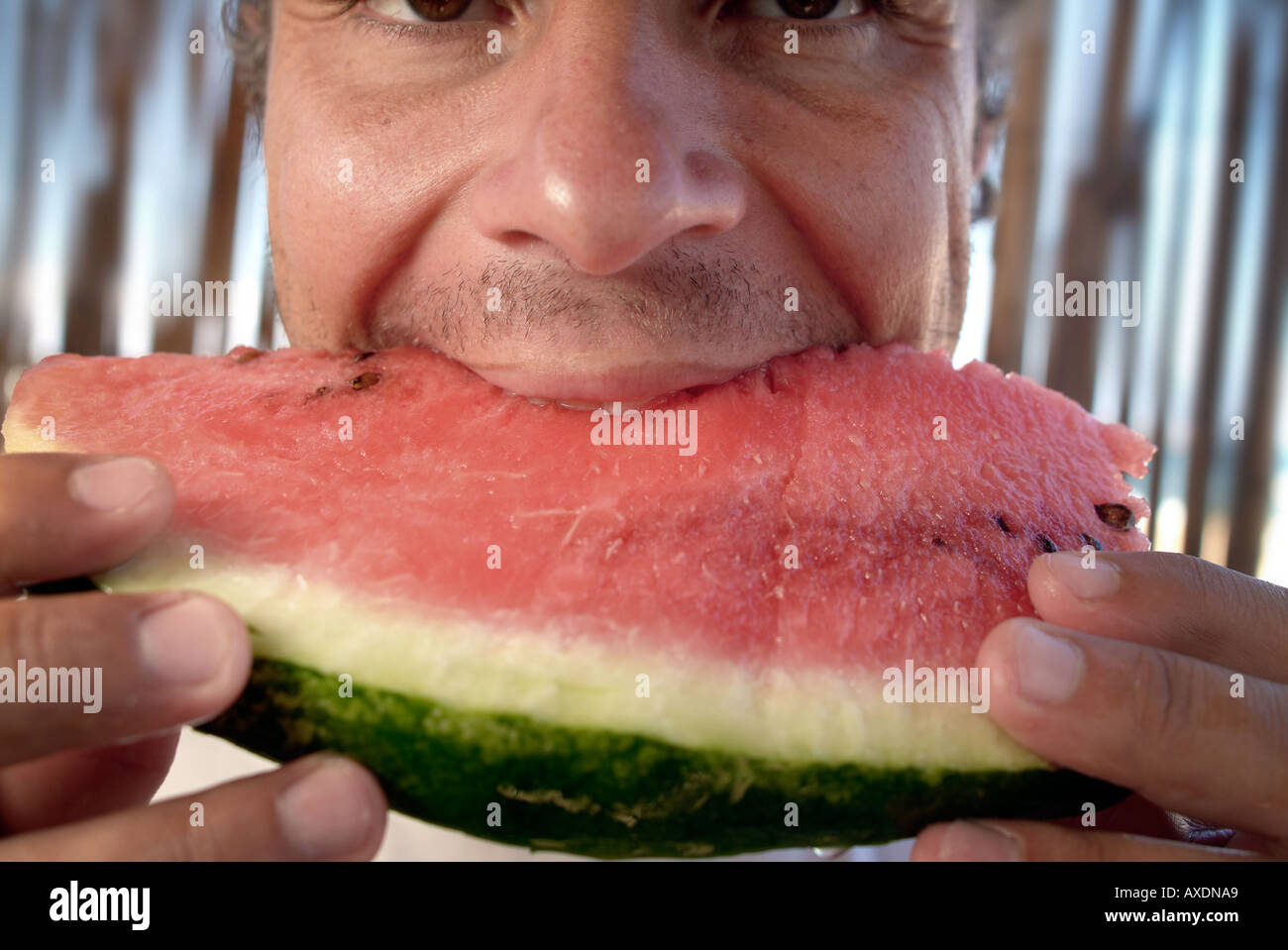 Bite off watermelon hi-res stock photography and images - Alamy