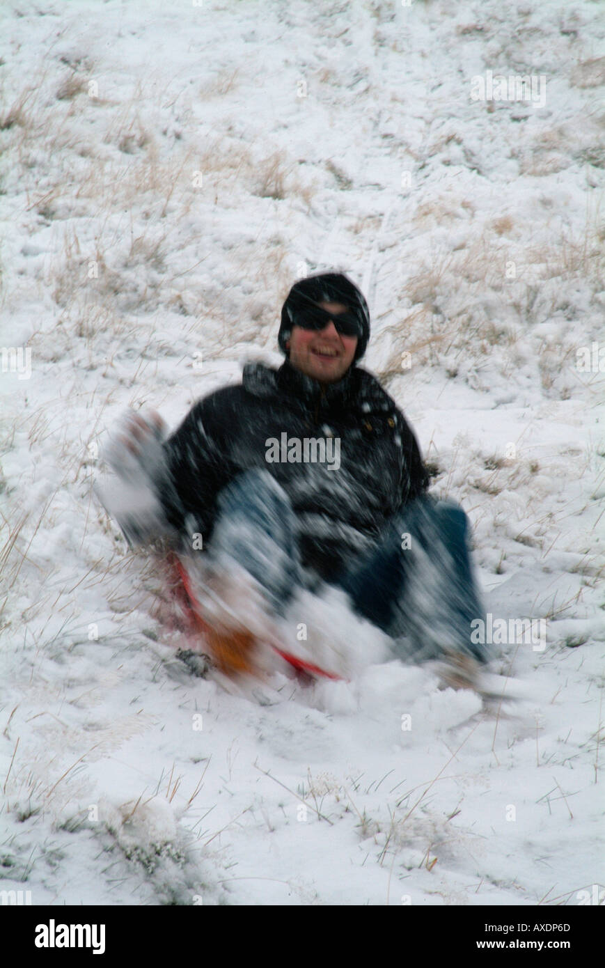 Sledge toboggan slide snow speed move England UK United Kingdom GB ...