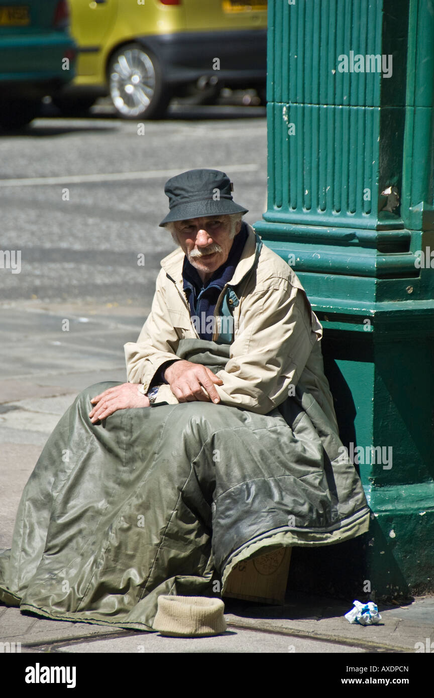 Candid picture of a man begging on a street in Edinburgh, Scotland ...