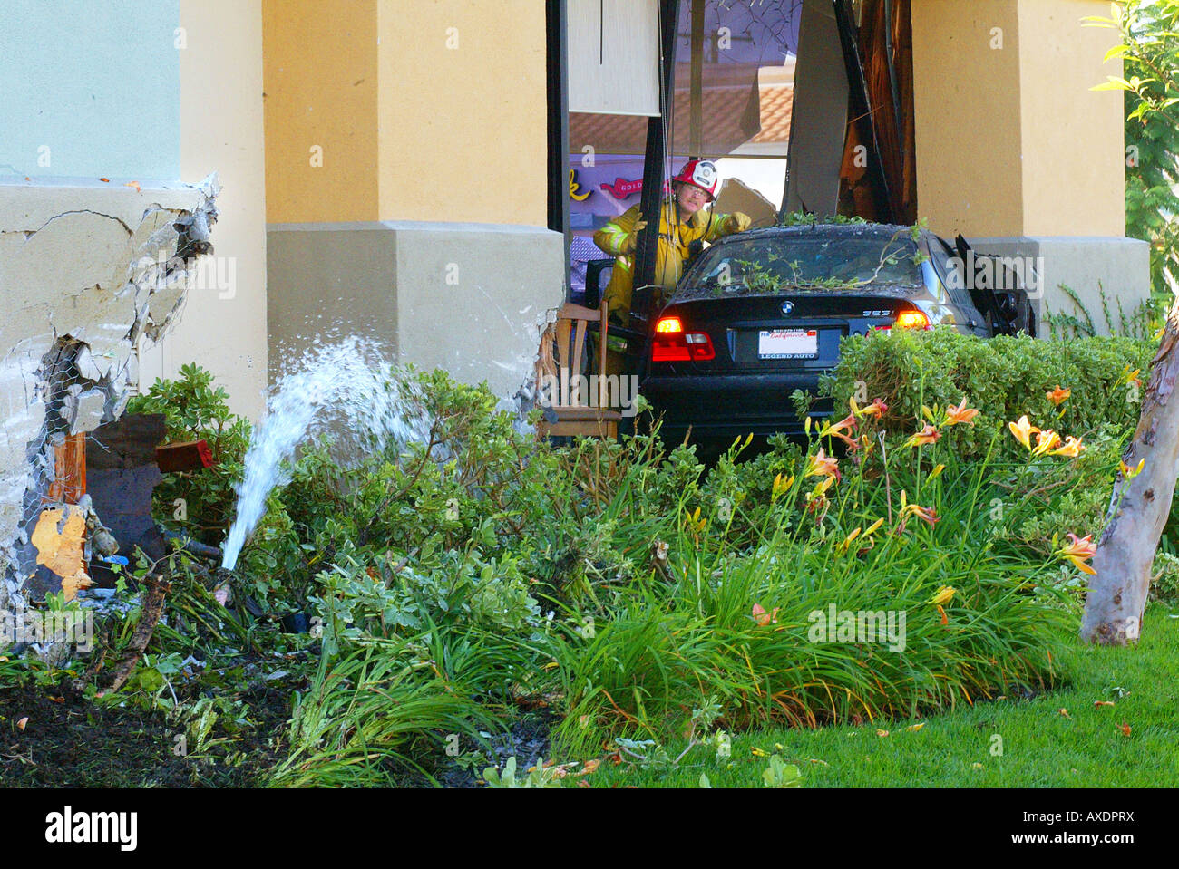 Car crashes into building Stock Photo - Alamy