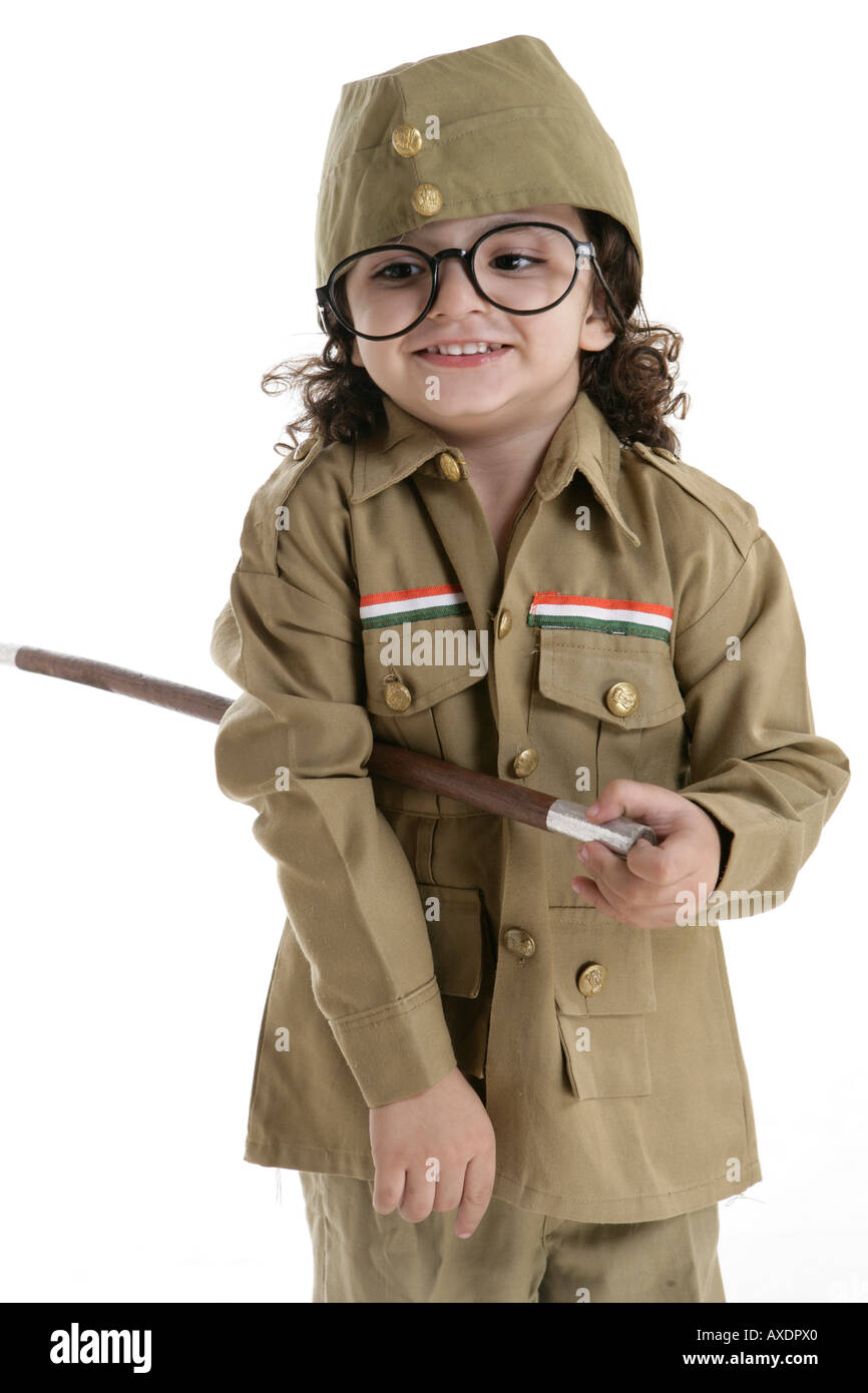 Portrait of a boy wearing policeman uniform Stock Photo - Alamy