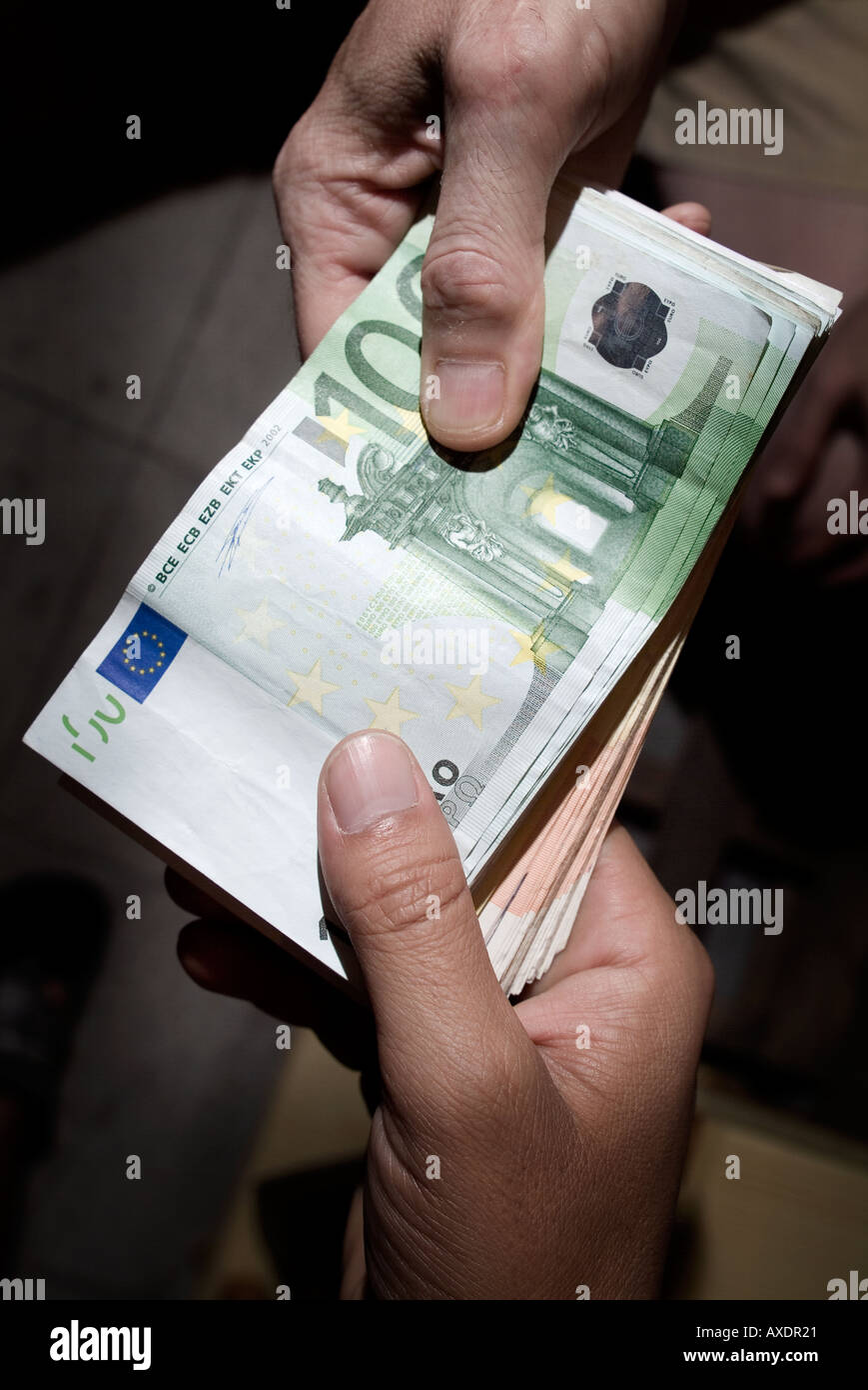 Money changing hands Stock Photo - Alamy