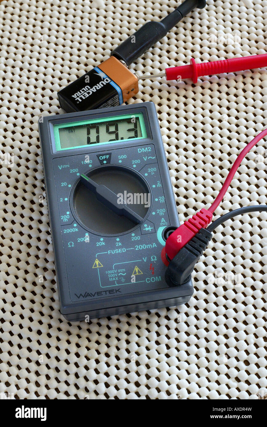 Voltmeter measures battery power level Stock Photo - Alamy