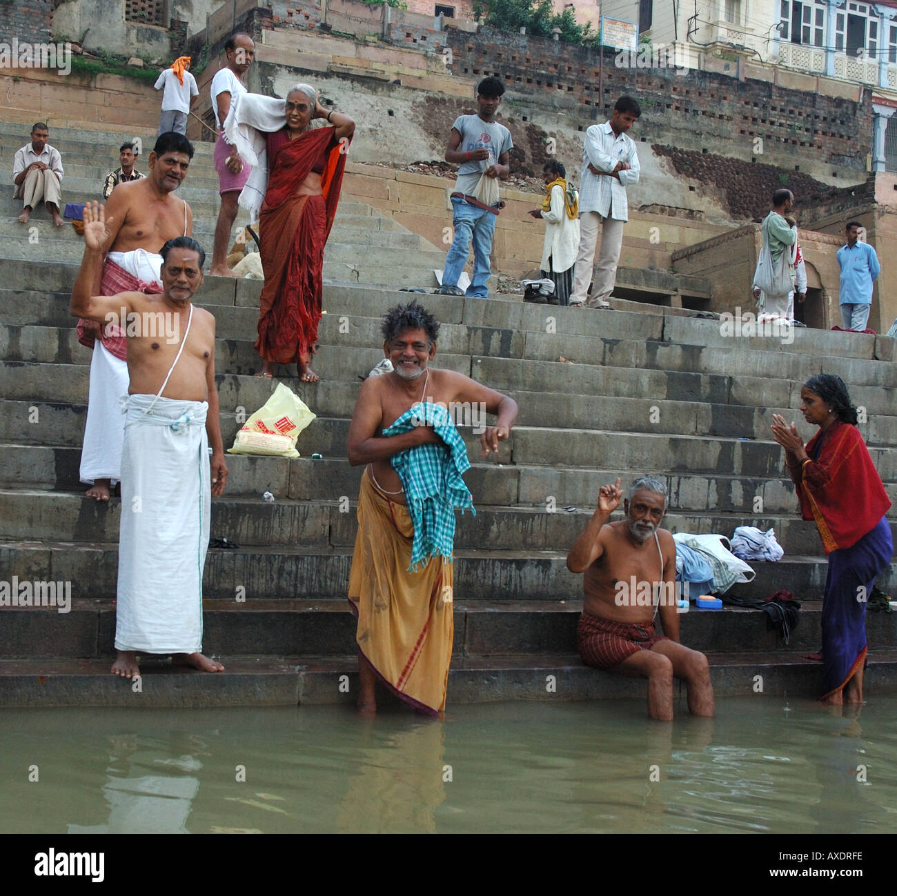 Hindu pilgrims bathing in Ganges at Varanasi Stock Photo - Alamy