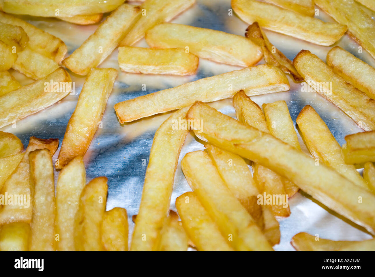 French fries on baking tray Stock Photo - Alamy
