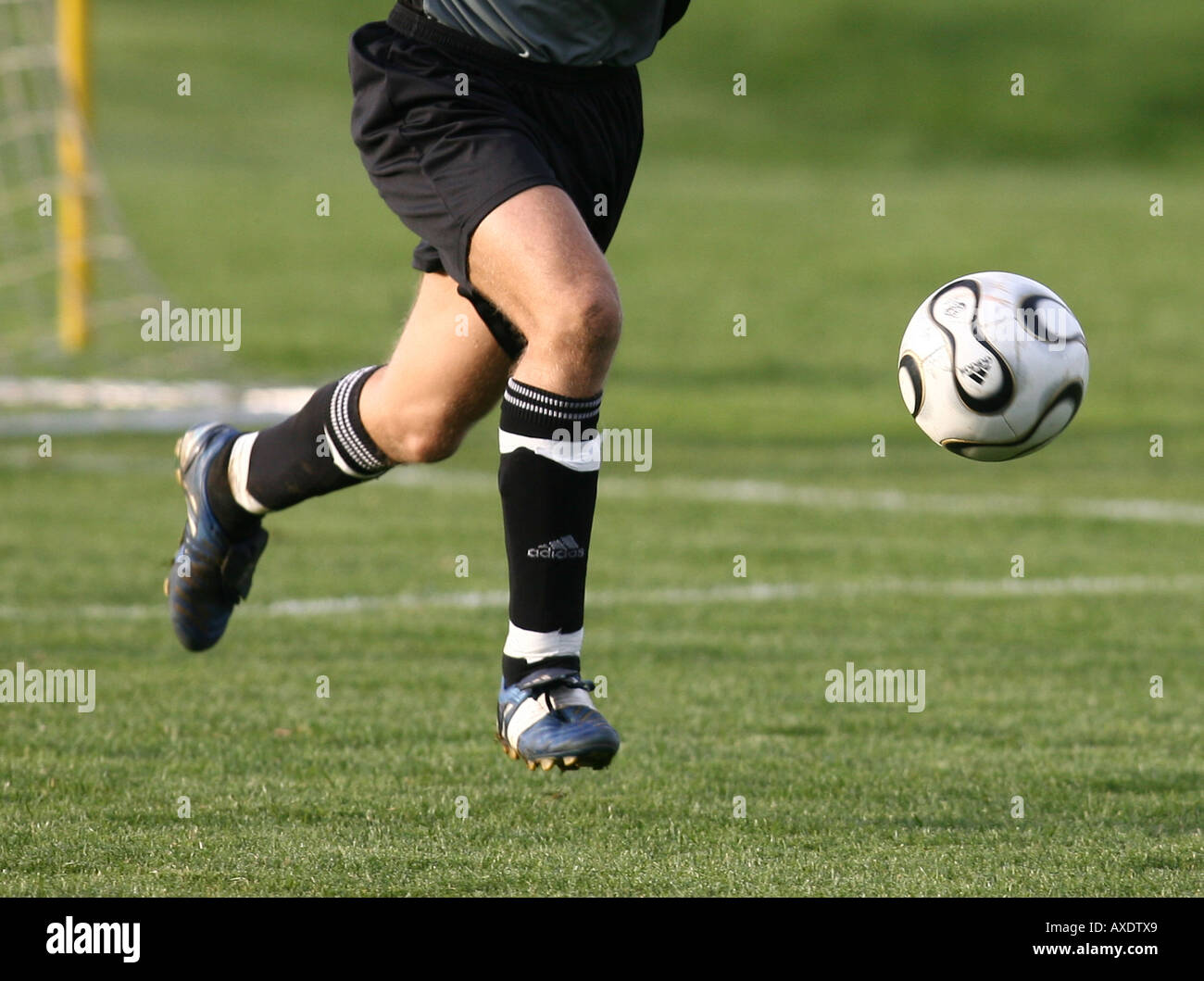 Forward with ball, WM ball Stock Photo - Alamy