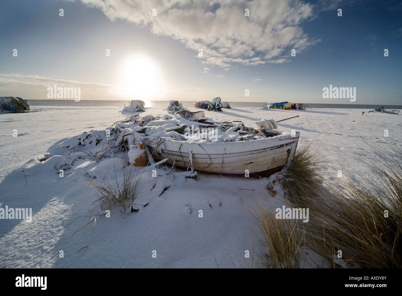 Old boat in Snow Stock Photo - Alamy