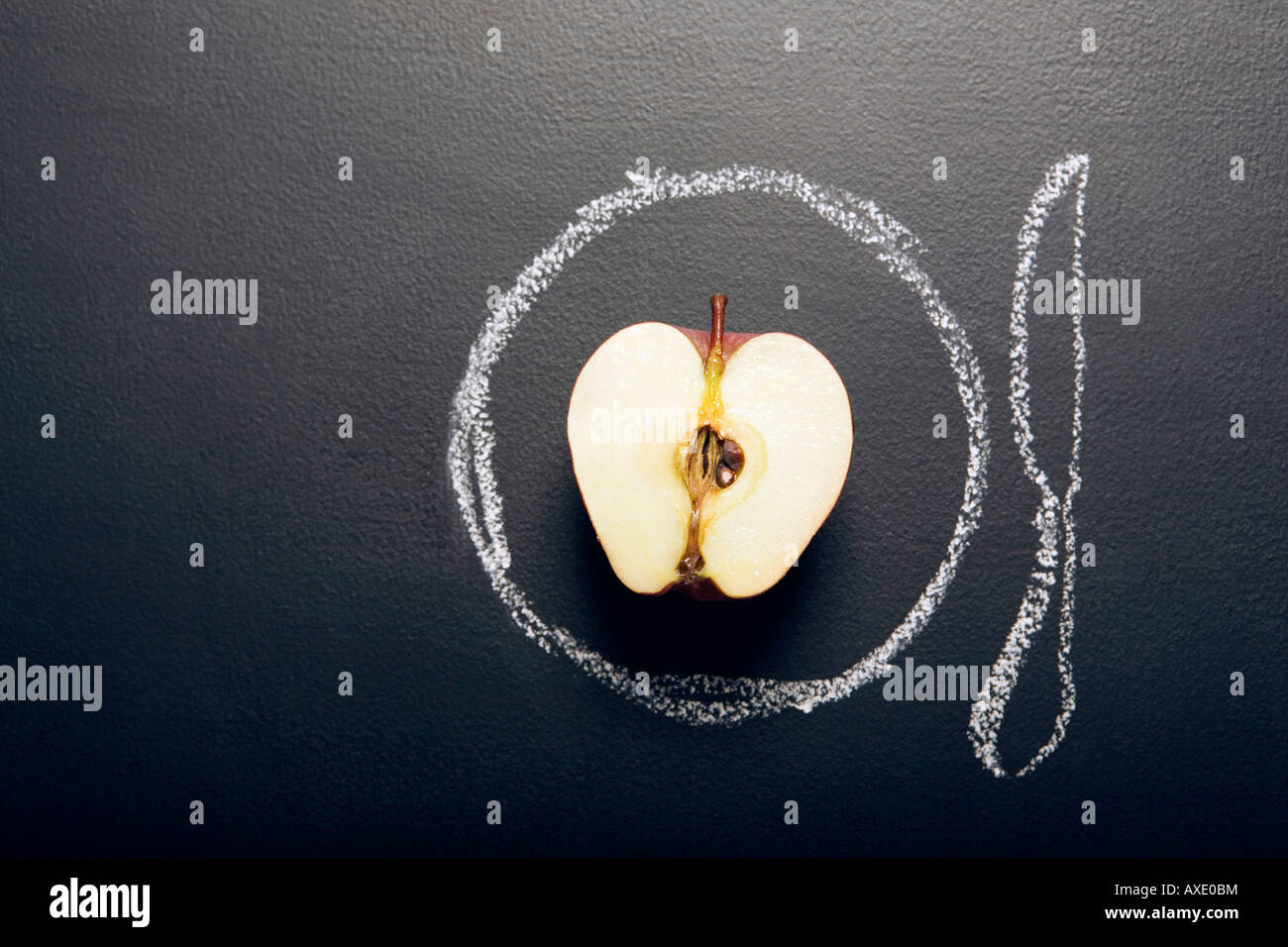 Apple sliced in half Stock Photo - Alamy