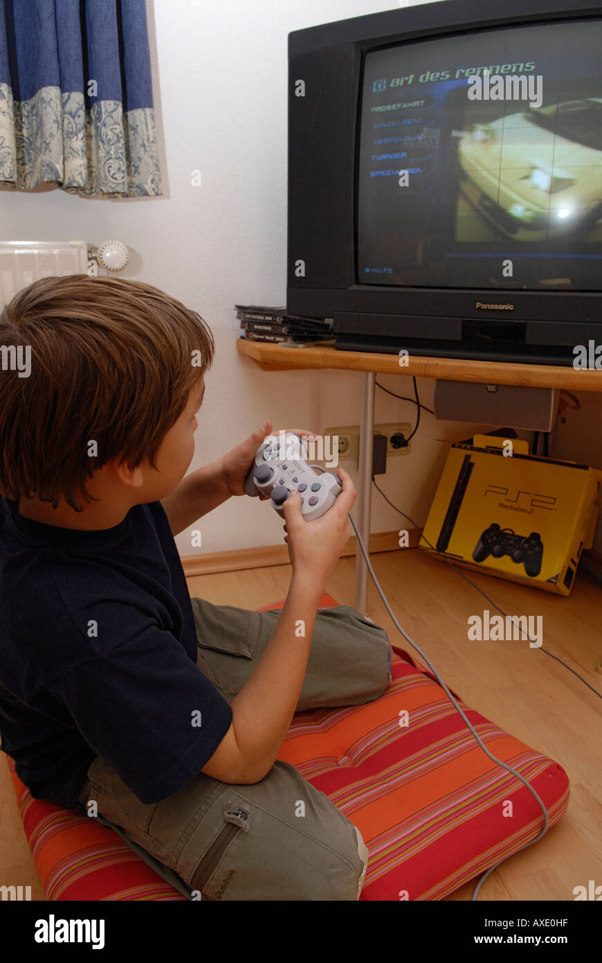 Children play playstation hi-res stock photography and images - Alamy