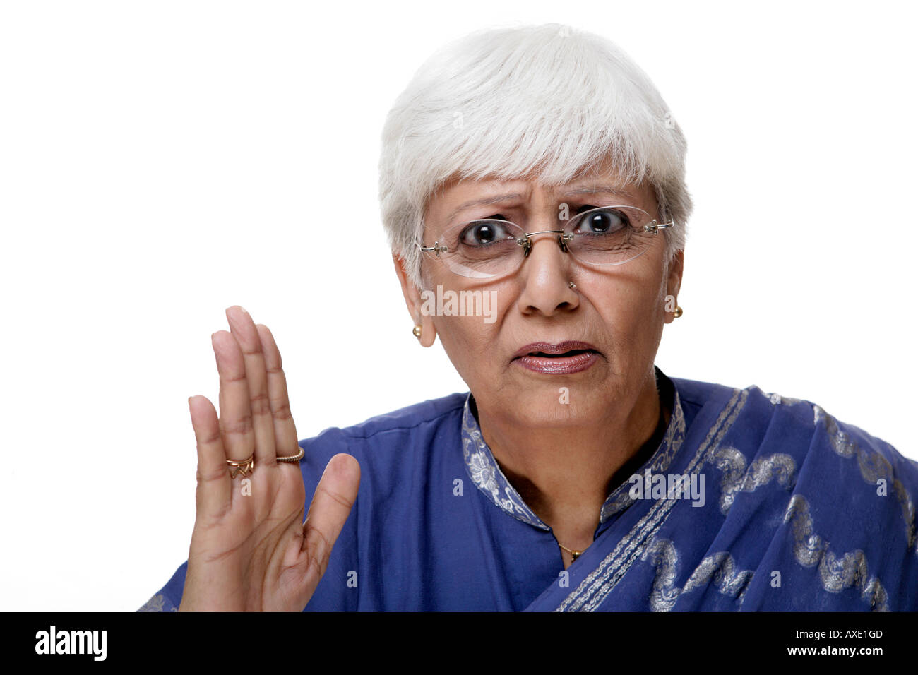 Portrait of a senior woman scolding and slapping Stock Photo - Alamy