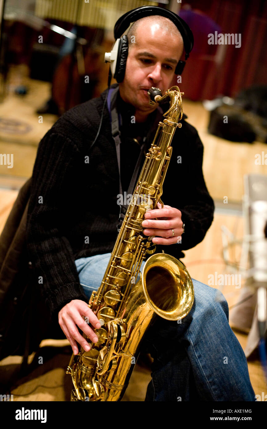 Tenor and alto saxophonists during studio rehearsal Stock Photo - Alamy