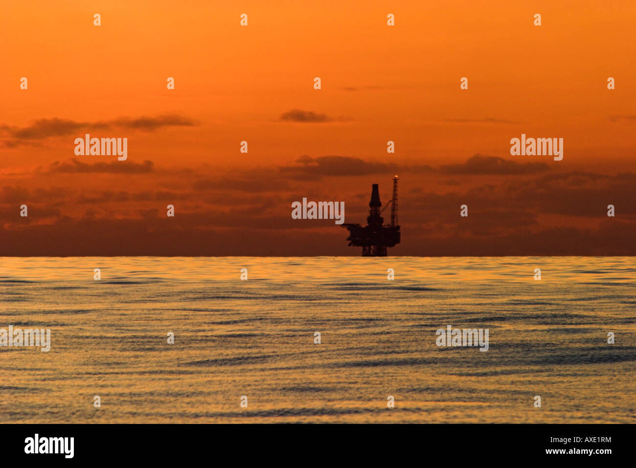rig at sunset Stock Photo - Alamy