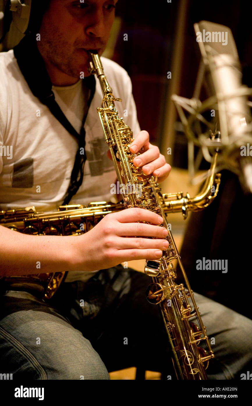 Tenor and alto saxophonists during studio rehearsal Stock Photo - Alamy