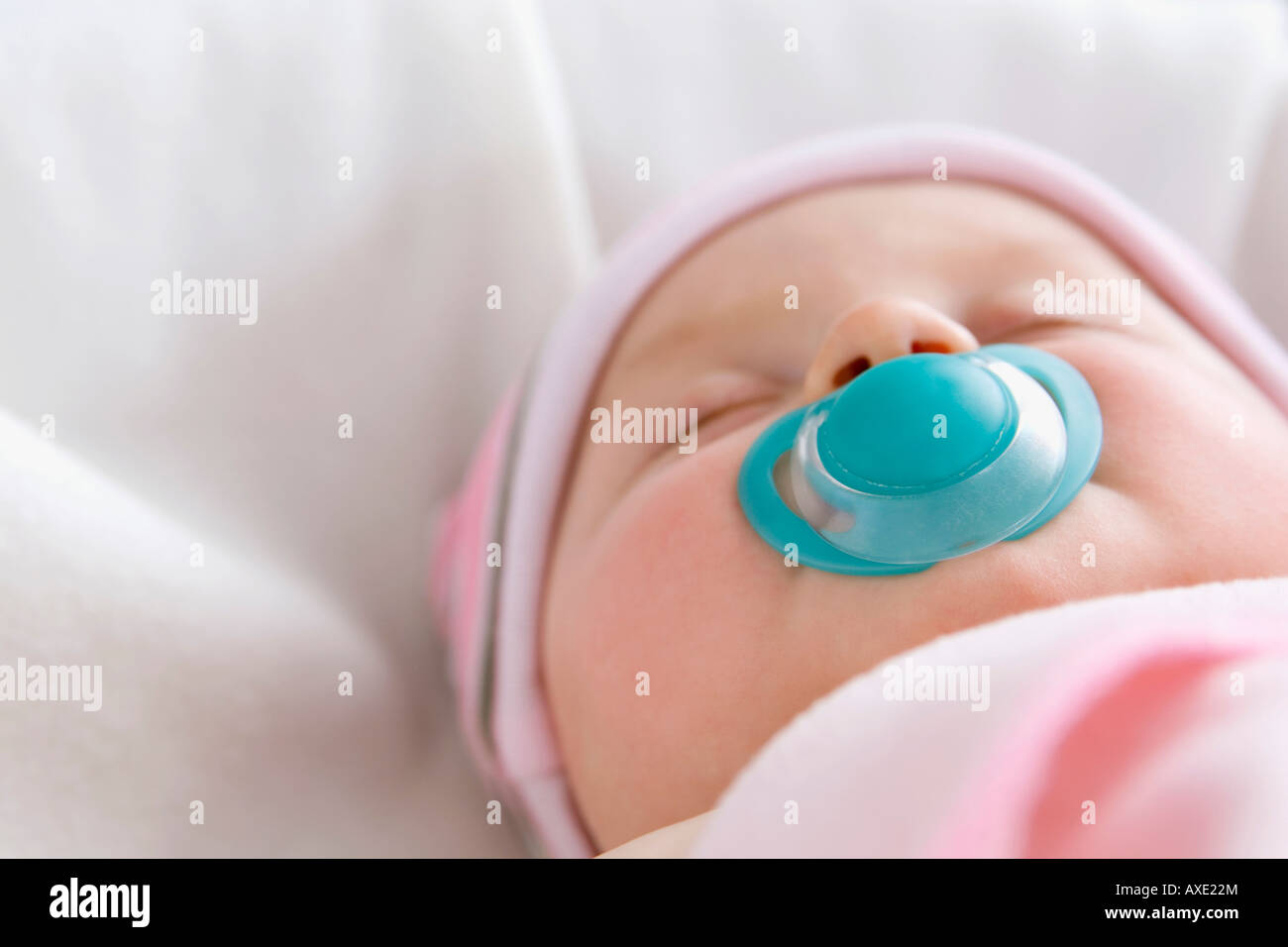 Baby boy 6 9 sleeping pacifer hi-res stock photography and images - Alamy