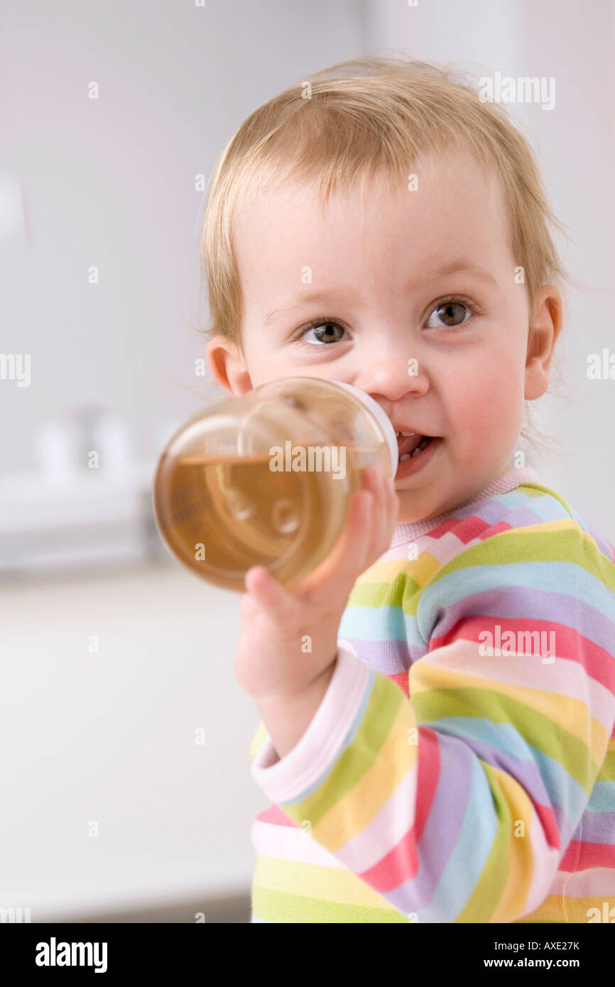 Baby girl (2-3) drinking tea, portrait Stock Photo - Alamy