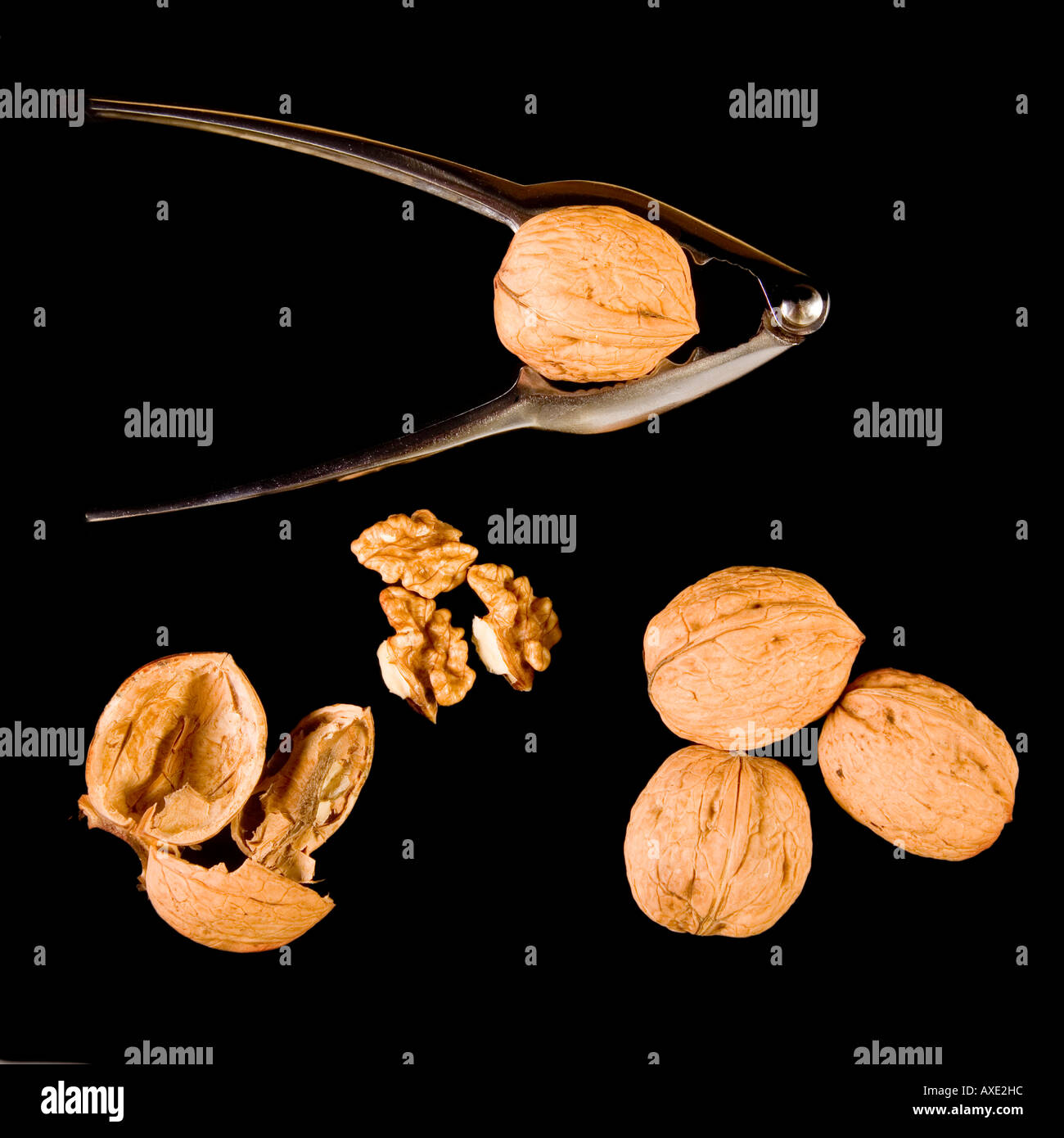Walnuts with nutcracker Stock Photo - Alamy