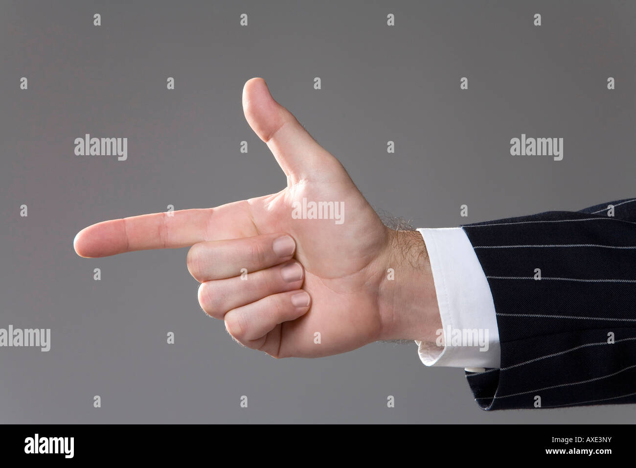 Man making hand gesture, pointing, close-up Stock Photo - Alamy