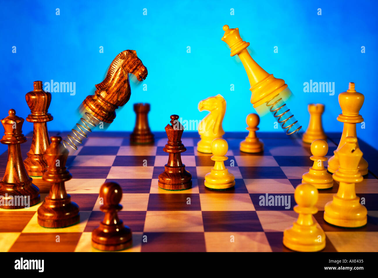 Chess pieces attacking Stock Photo - Alamy