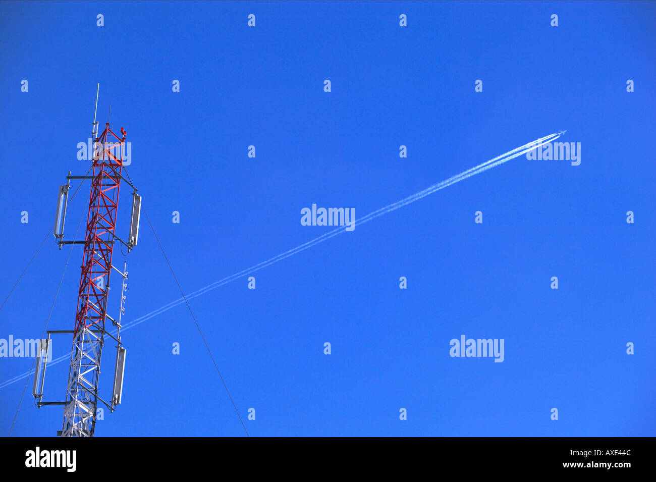 Communications Tower and Airplane Stock Photo - Alamy