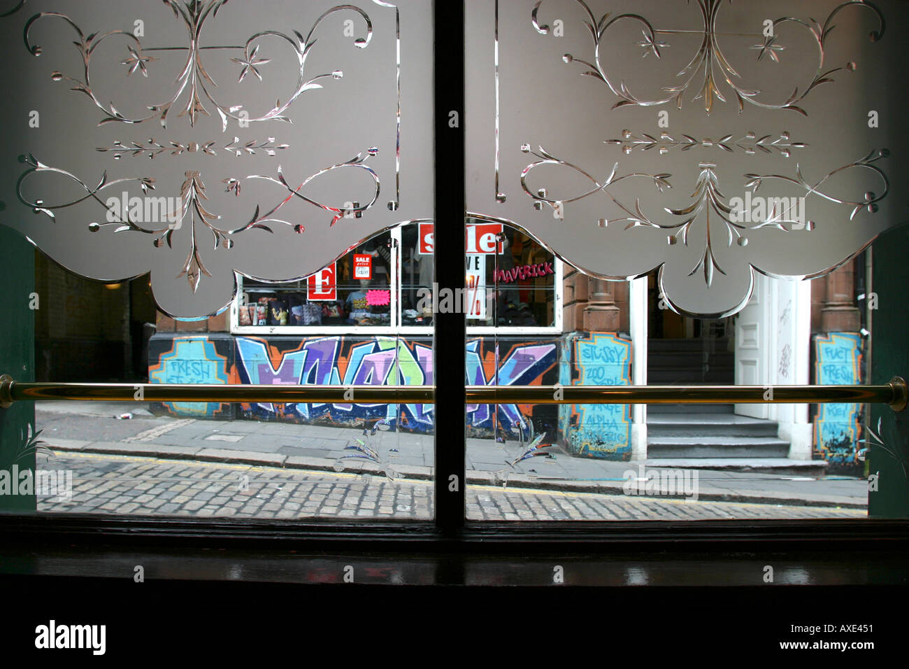 View through pub window with pretty etched glass Newcastle UK Stock ...