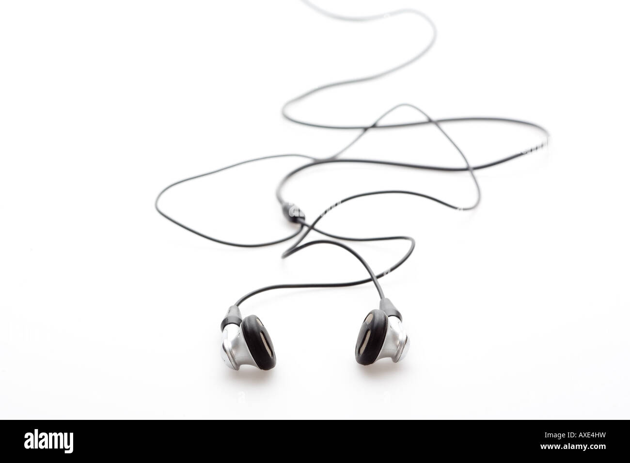 earphones isolated on white background Stock Photo - Alamy