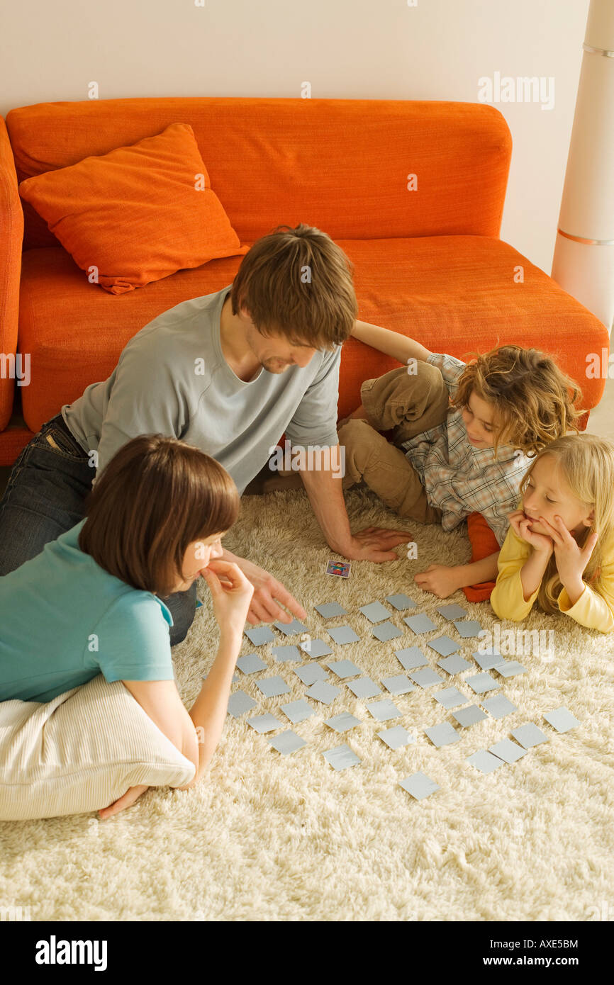 Family playing memory Stock Photo - Alamy