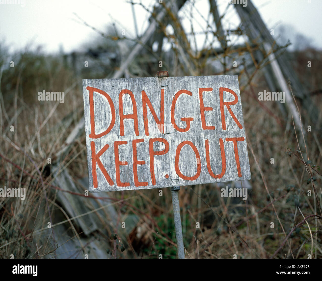 Old danger sign in countryside Stock Photo - Alamy