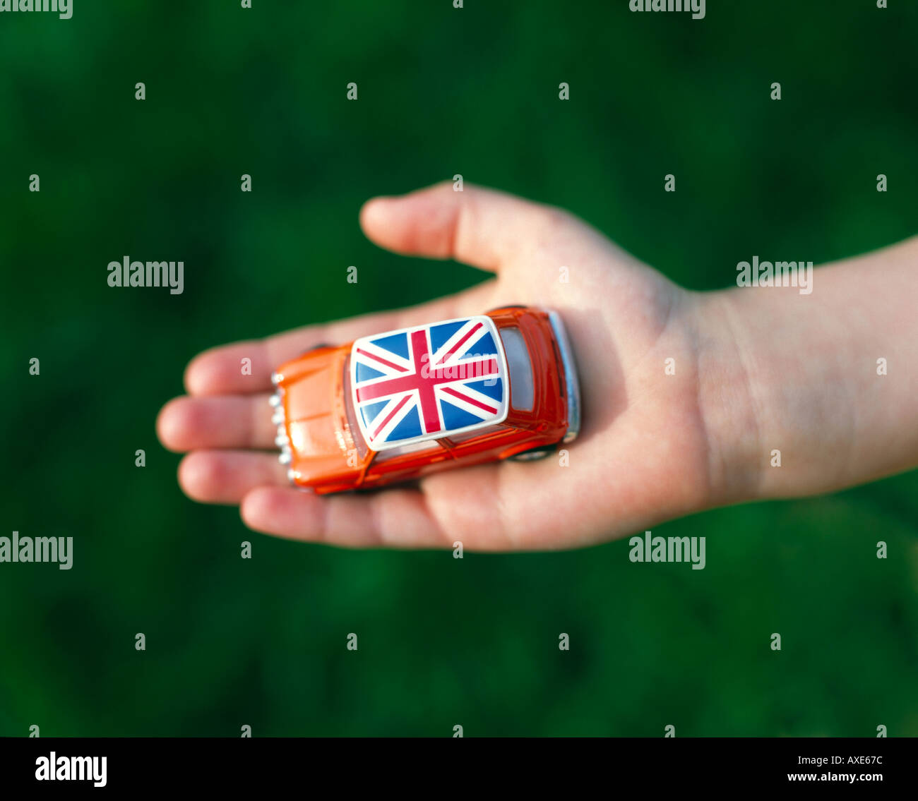 Toy Mini Car In Childs Hand Stock Photo Alamy toy-mini-car-in-childs-hand-stock-photo-alamy