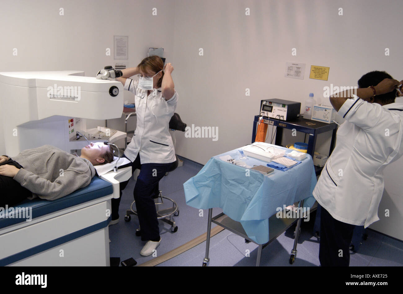 MANDATORY CREDIT MICHAEL CRAIG NURSES PREPARE A PATIENTS EYE PRIOR TO ...