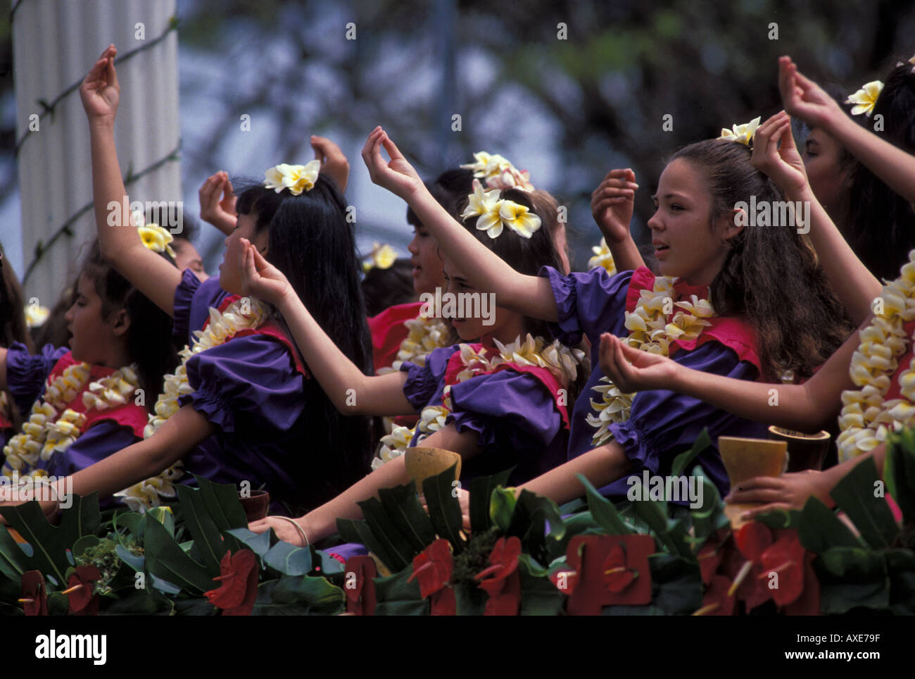 Hula dancer girls on float with leis Merry Monarch Festival parade Hilo ...