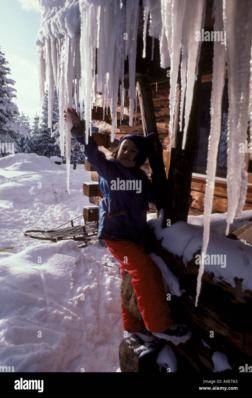 Girl with icicle hi-res stock photography and images - Alamy