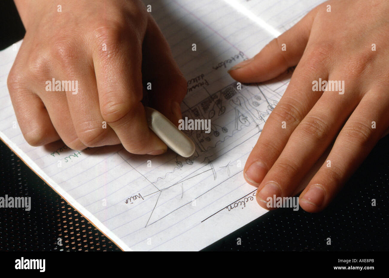 Student correcting homework Stock Photo - Alamy