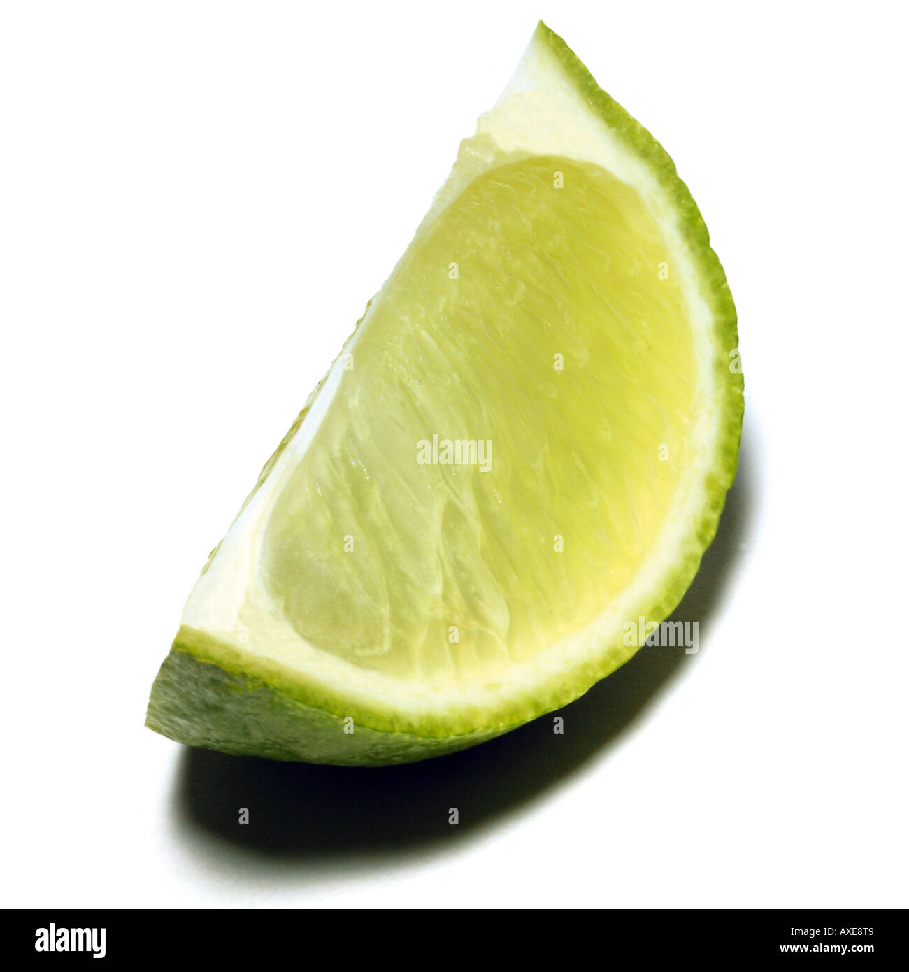 Wedge of fresh lime Stock Photo - Alamy