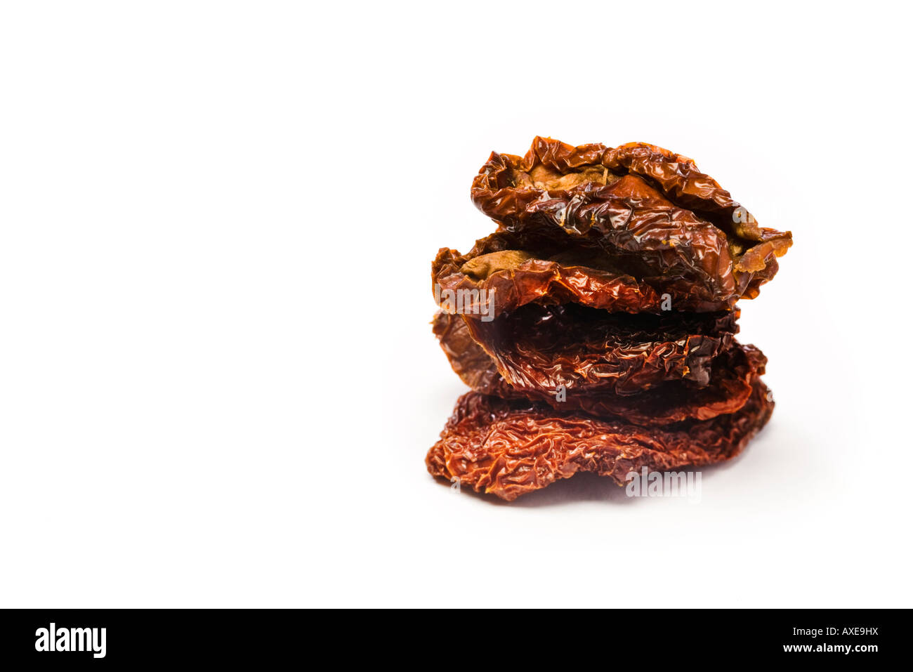 Stack of sun dried tomatoes close up Stock Photo - Alamy
